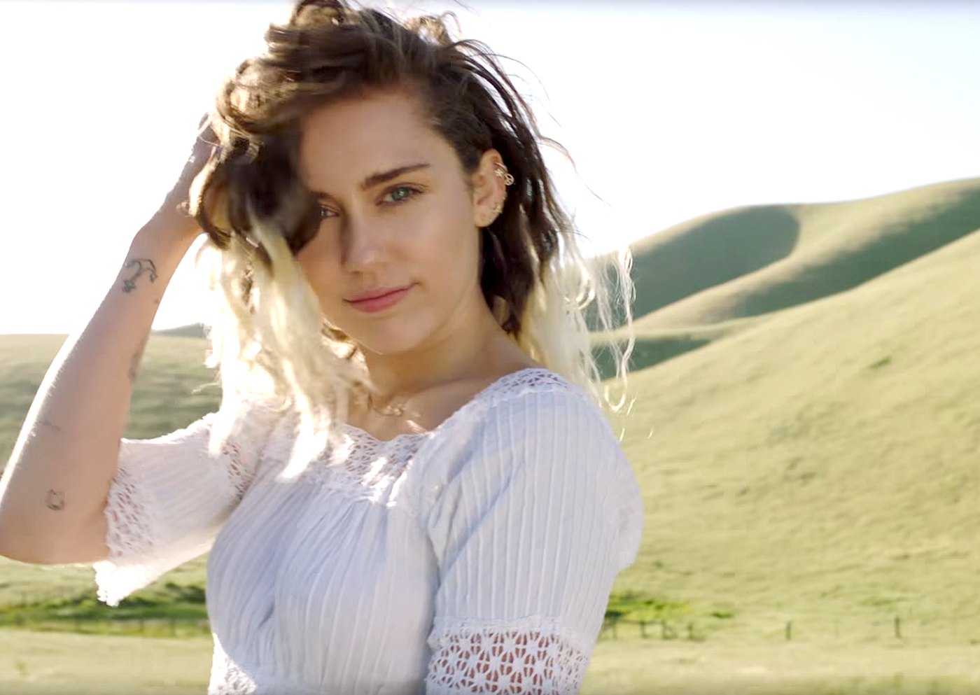 Miley Cyrus Releases Breezy ‘Malibu’ Music Video: Watch | Us Weekly